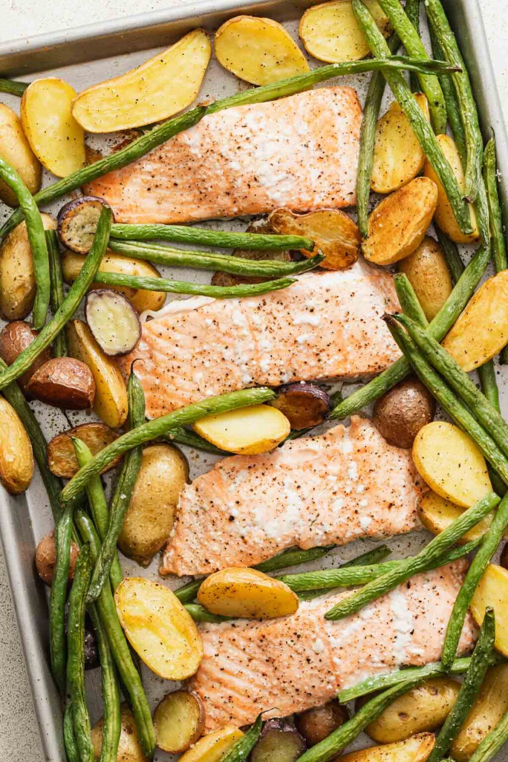Sheet Pan Salmon and Green Beans with Potatoes - The Dizzy Cook